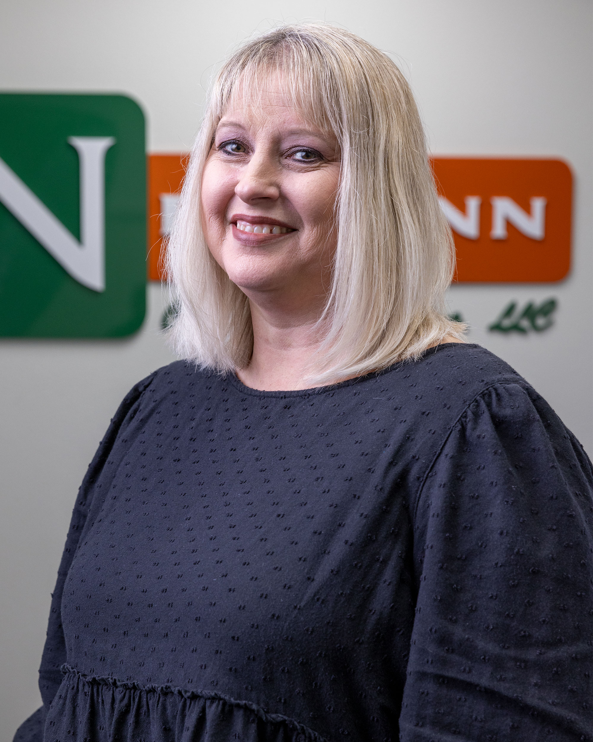 Christie Major - Neumann Roofing